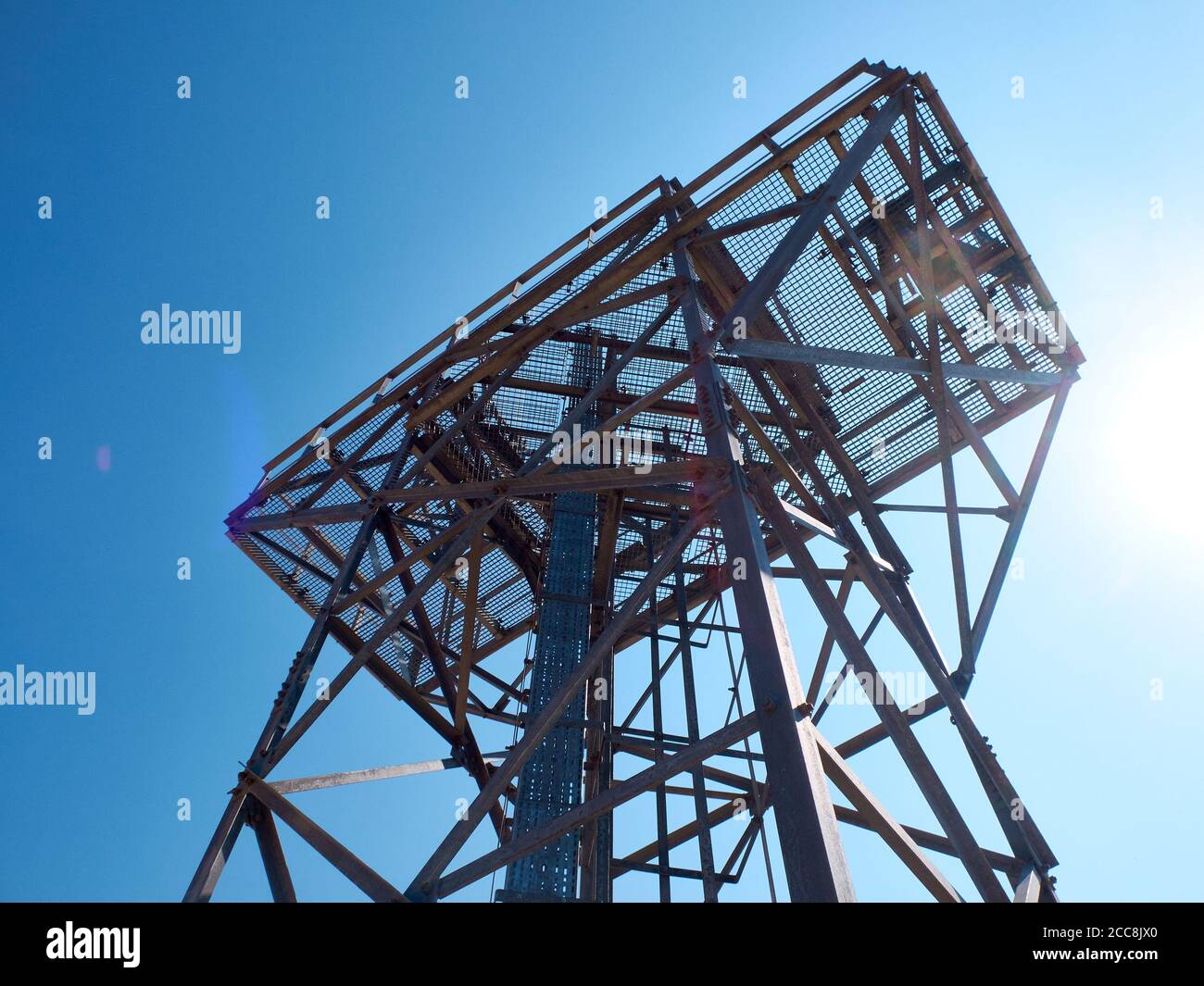 Metal frame of the radar tower low angle view Stock Photo - Alamy