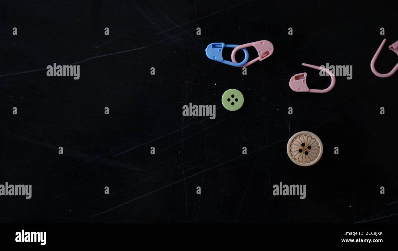Colourful safety pins and buttons Stock Photo - Alamy