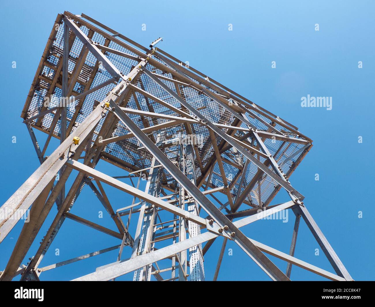 Metal frame of the radar tower low angle view Stock Photo - Alamy