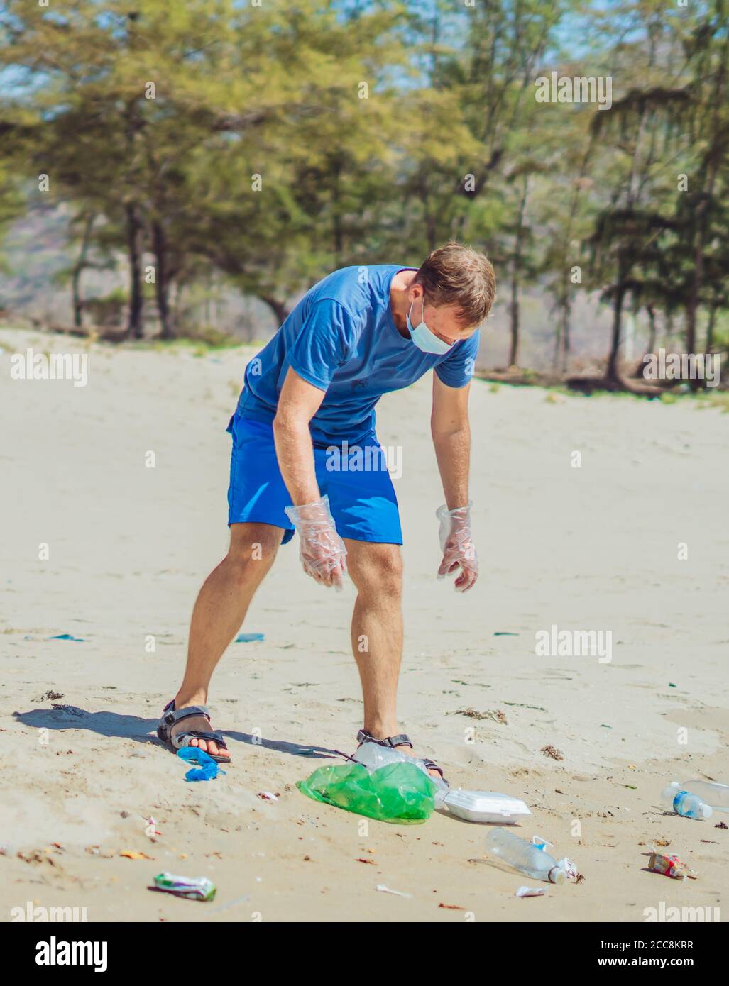 Plastic waste buried in sand hi-res stock photography and images - Alamy