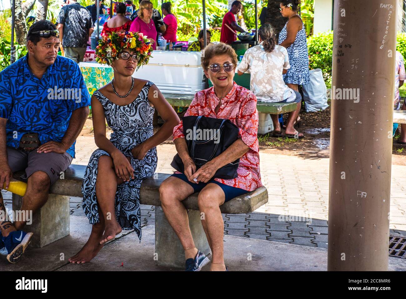 Moorea, French Polynesia: 09/03/2018: Local people sitting and talking ...
