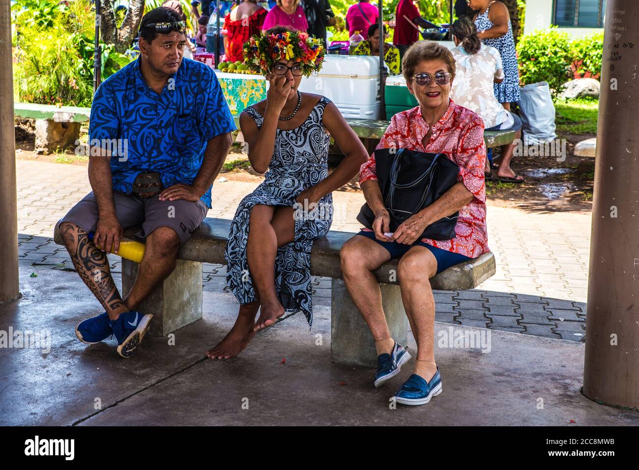 Moorea, French Polynesia: 09/03/2018: Local people sitting and talking ...