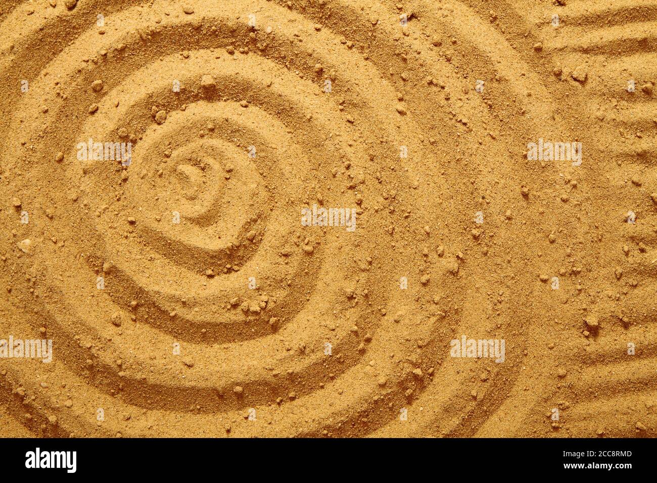 circles in the sand as nice summer background Stock Photo - Alamy