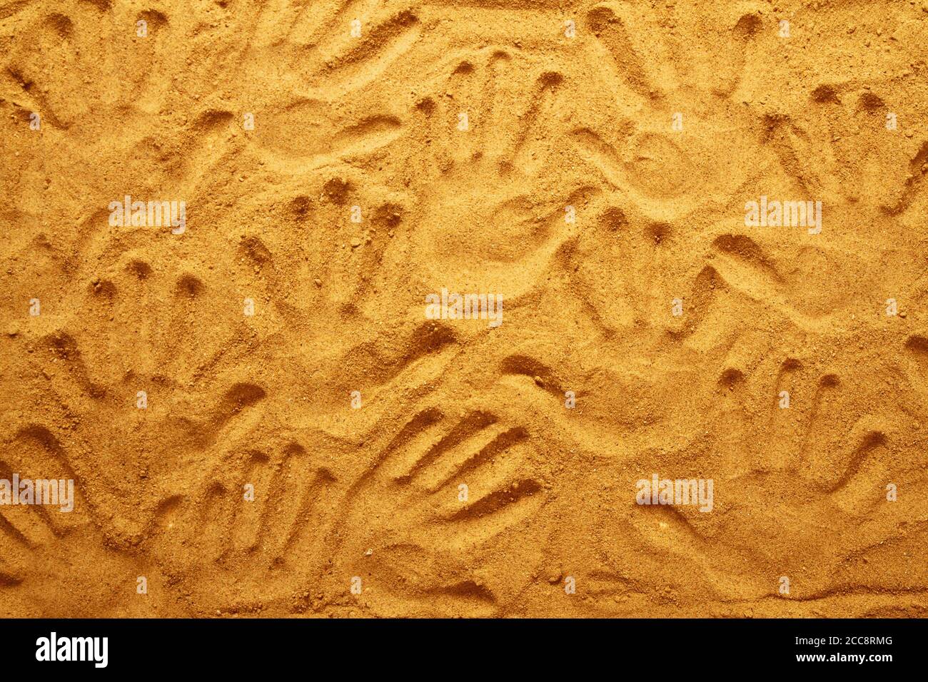 hand prints in the sand as nice summer background Stock Photo - Alamy