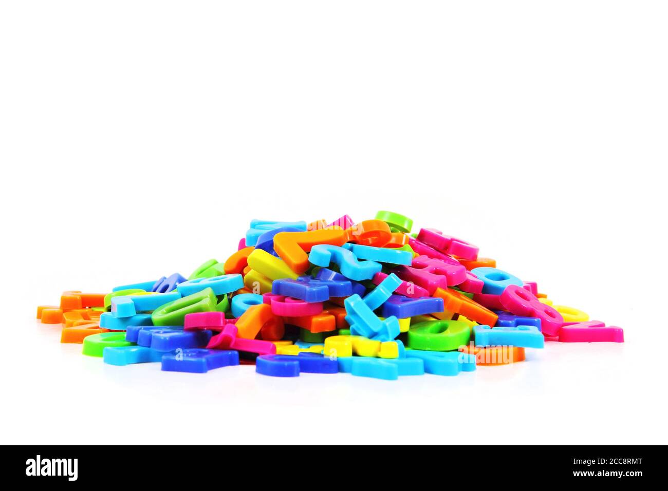 color plastic letters isolated on the white background Stock Photo - Alamy