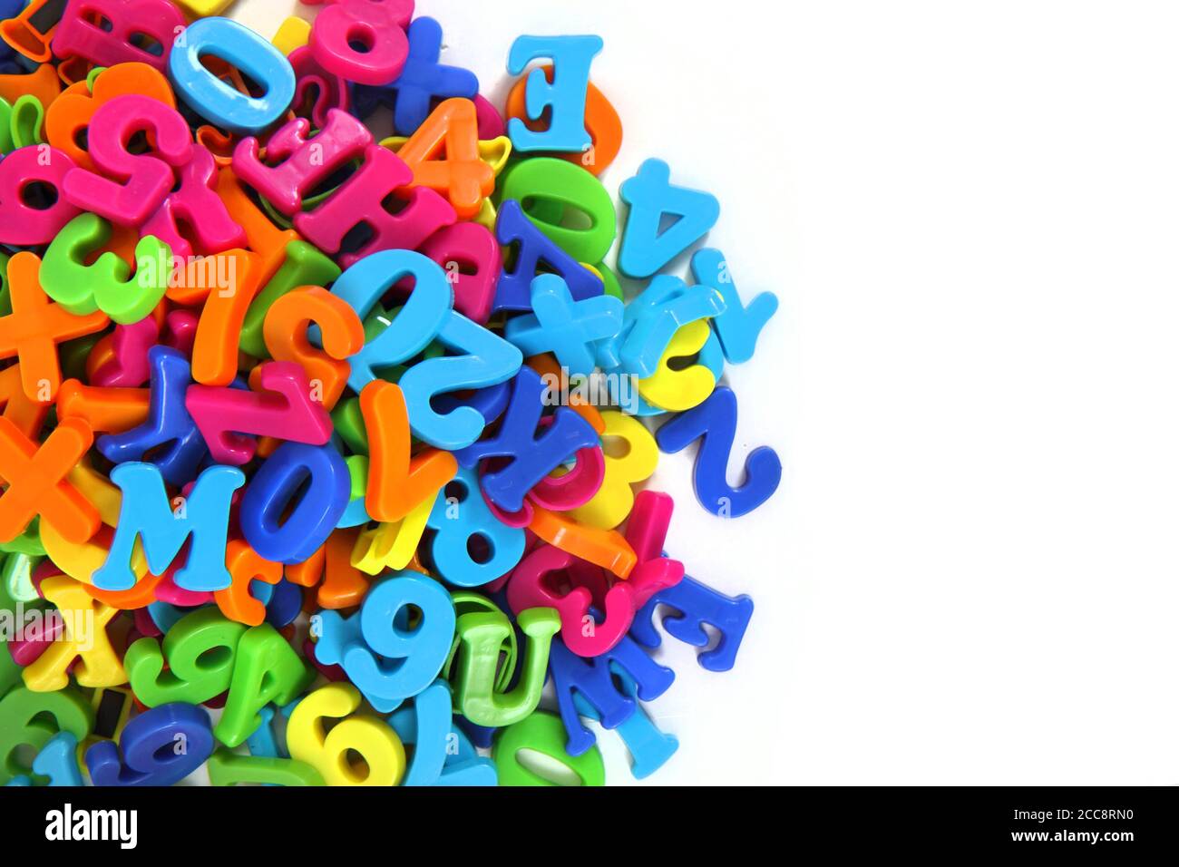 color plastic letters isolated on the white background Stock Photo - Alamy