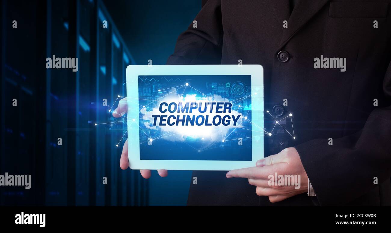 Young business person working on tablet and shows the inscription ...