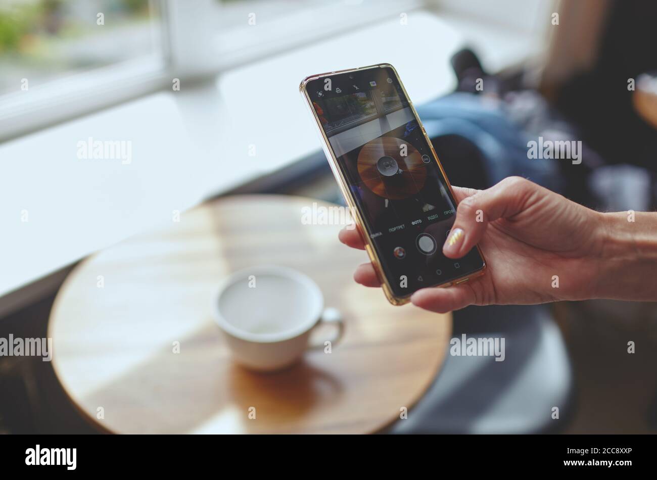Hand taking coffee cup hi-res stock photography and images - Alamy