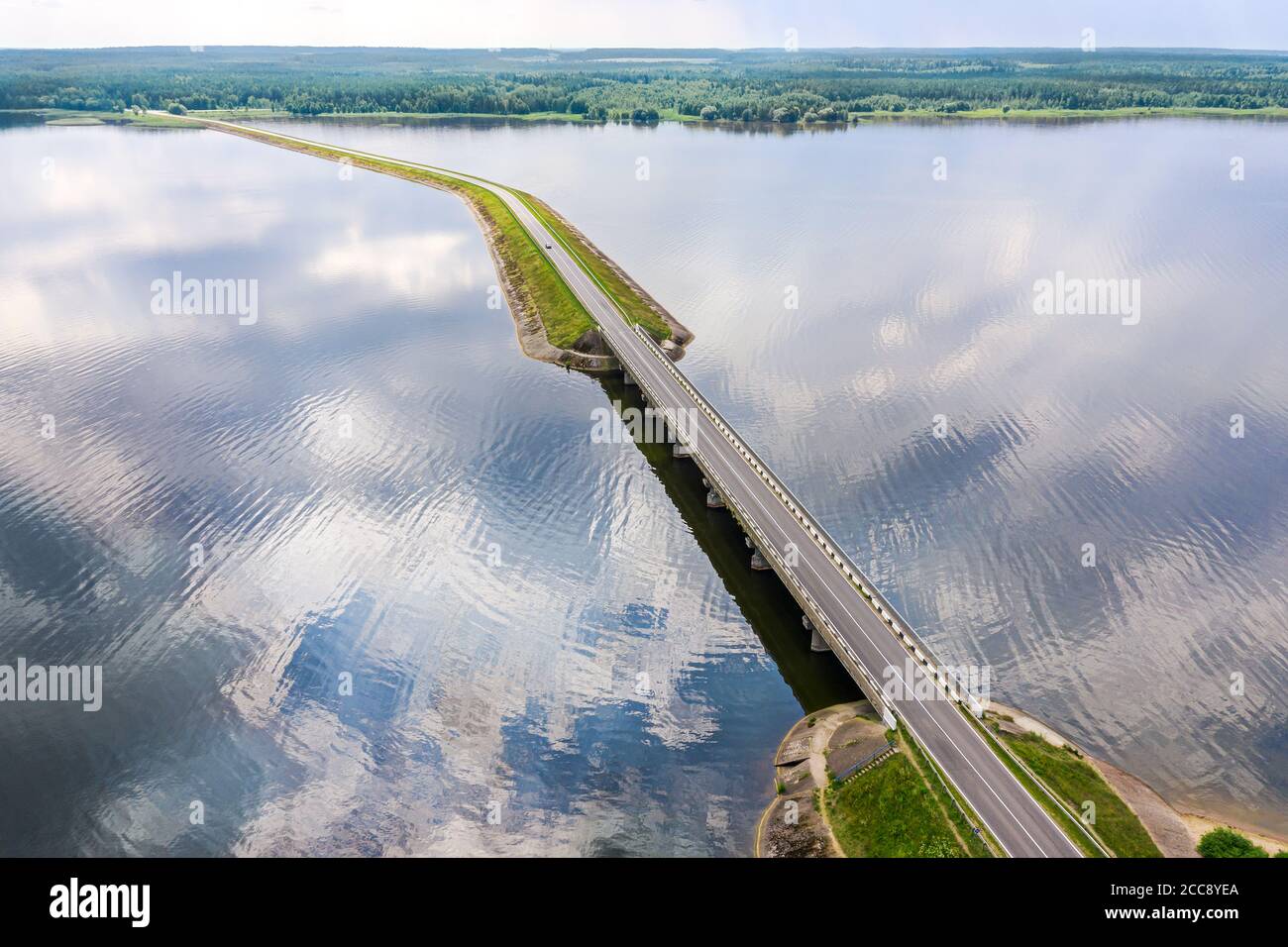 single lane road and bridge over Vileyka water reservoir, Belarus. top ...