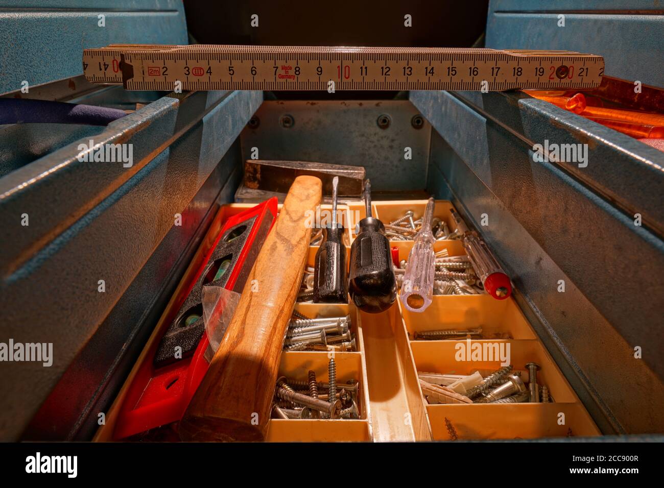 Various working tools in the metal toolbox Stock Photo - Alamy