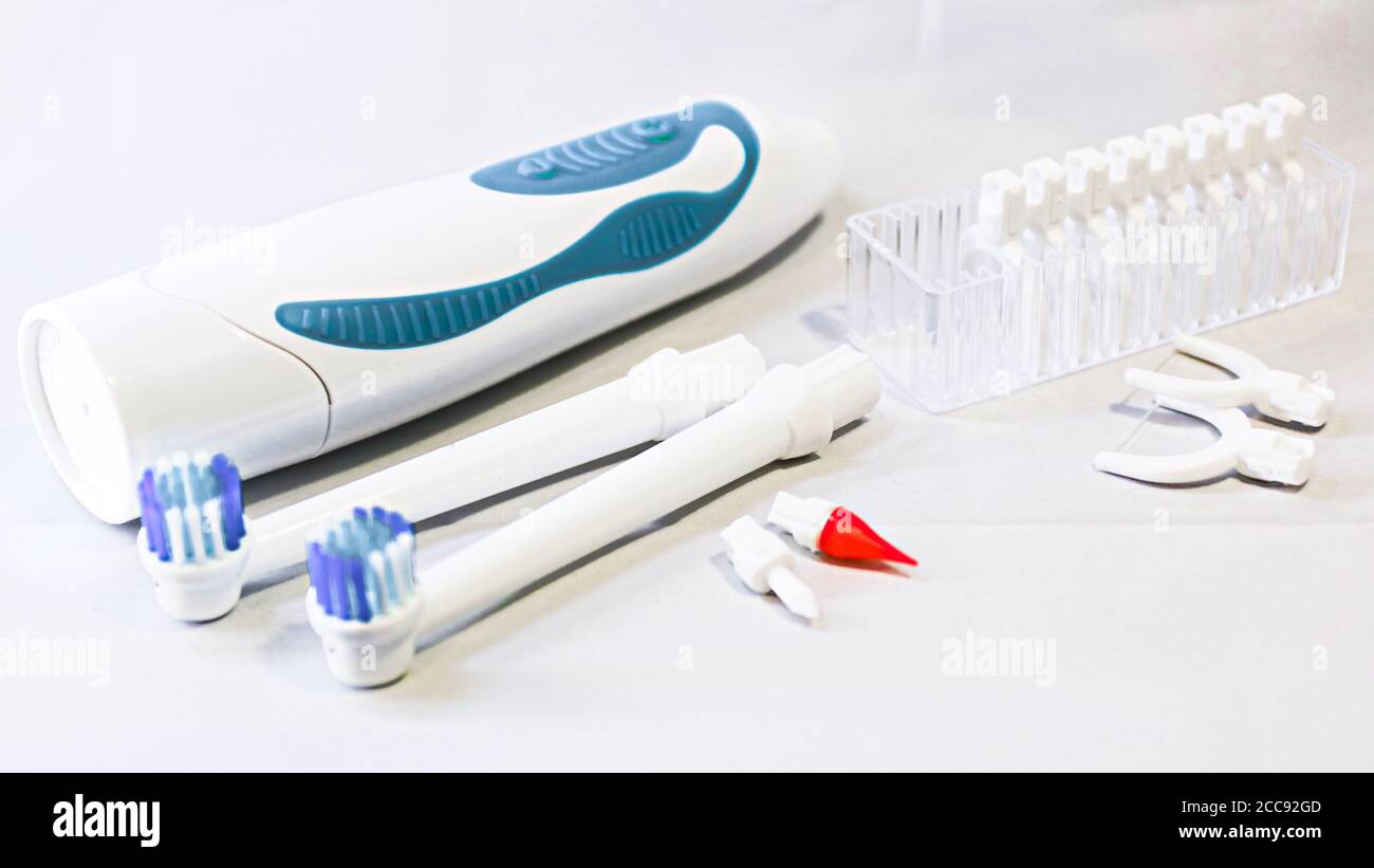 Electronic toothbrush with toothbrush heads white color background ...