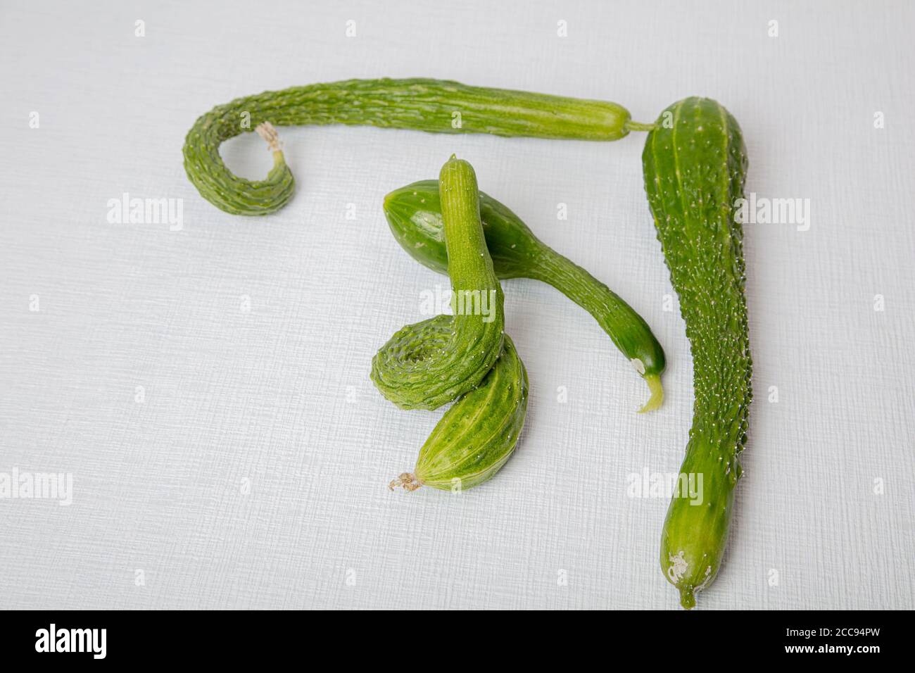 Crooked cucumbers hi-res stock photography and images - Alamy