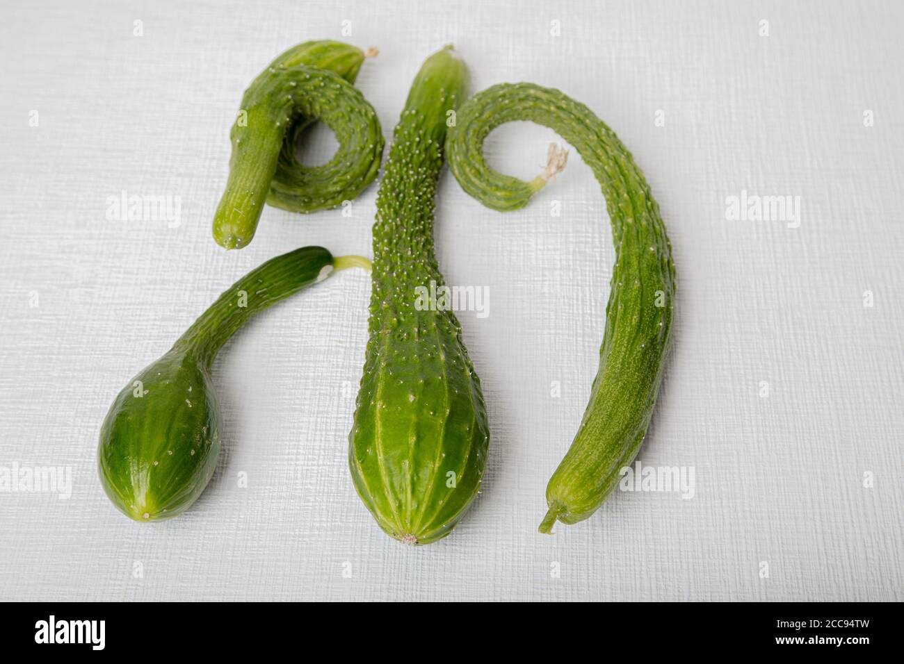 Crooked cucumbers hi-res stock photography and images - Alamy