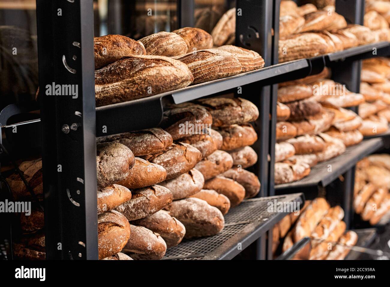 Wholegrain bread lying on shelves with homemade loaves Stock Photo - Alamy