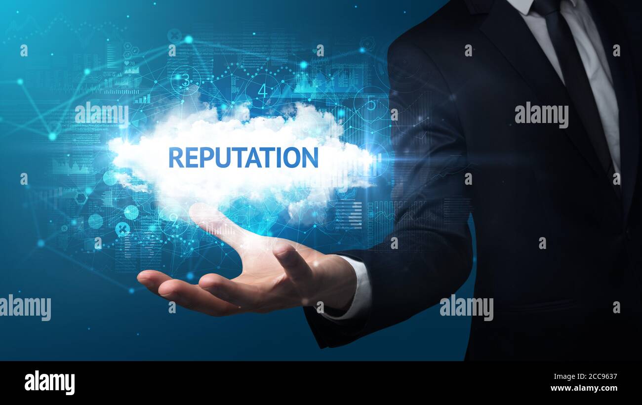 Hand of Businessman holding REPUTATION inscription, successful business ...