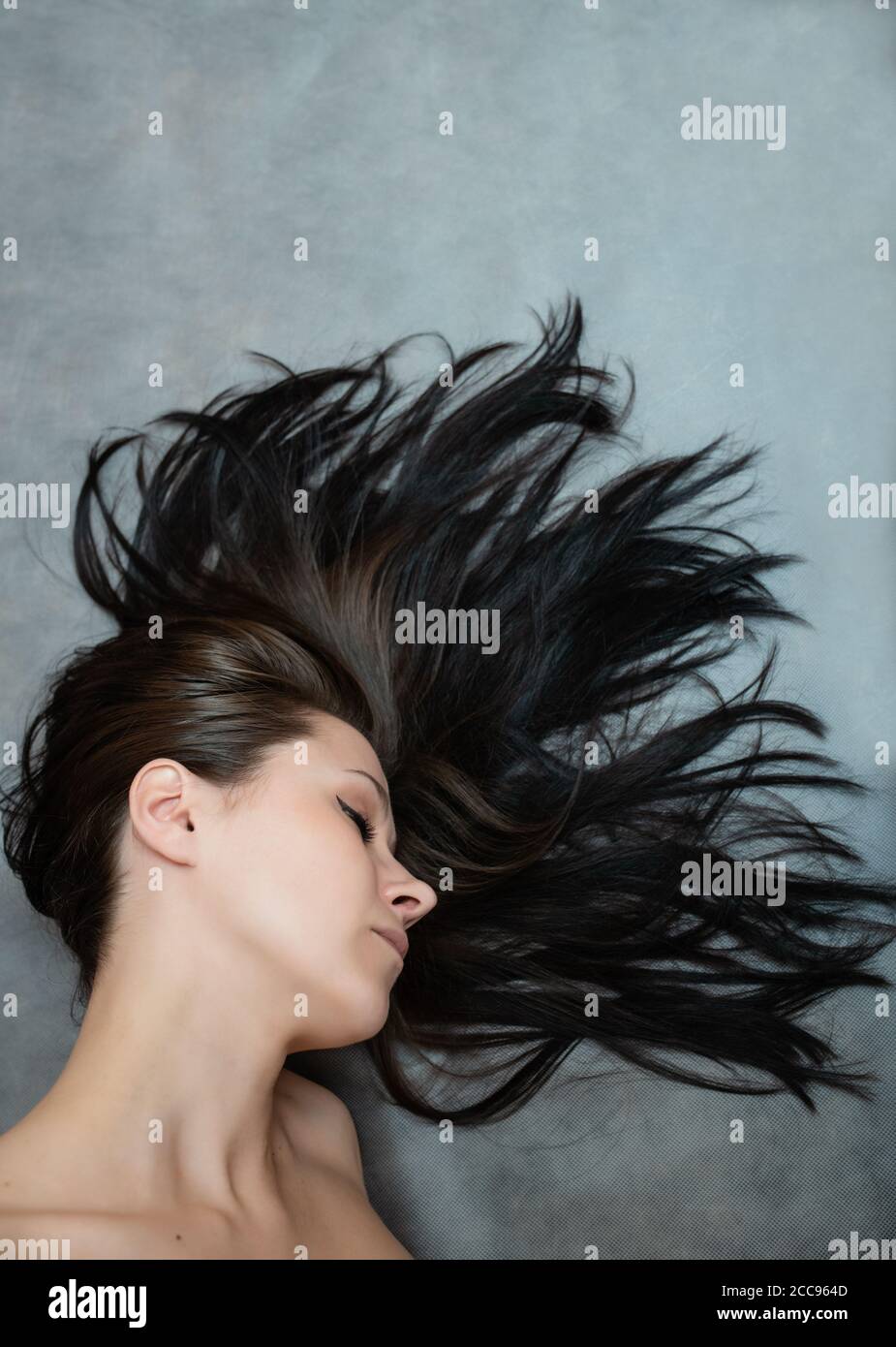 Beautiful black hair. Top view of women with beautiful hair on dark ...