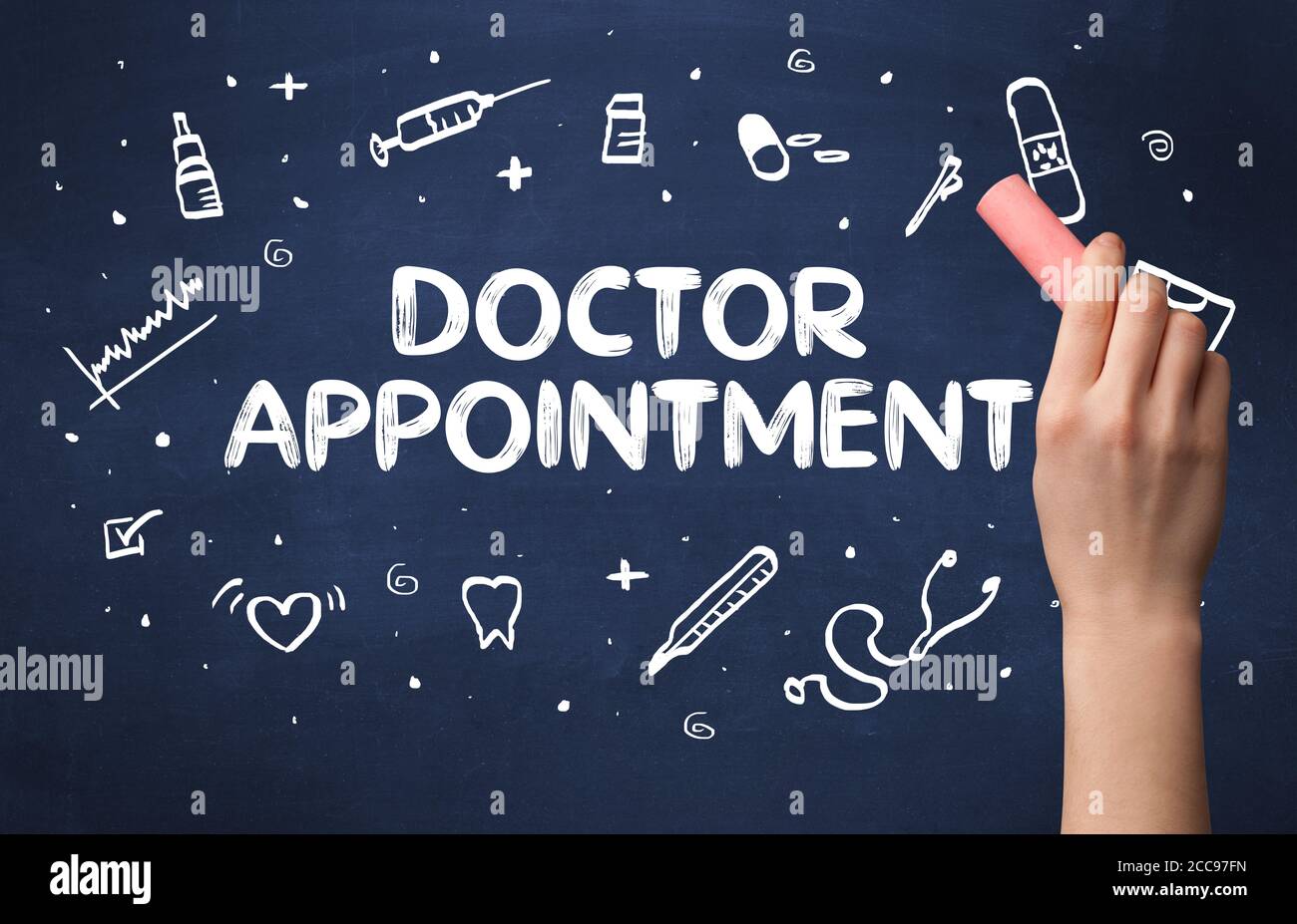 Hand drawing DOCTOR APPOINTMENT inscription with white chalk on ...