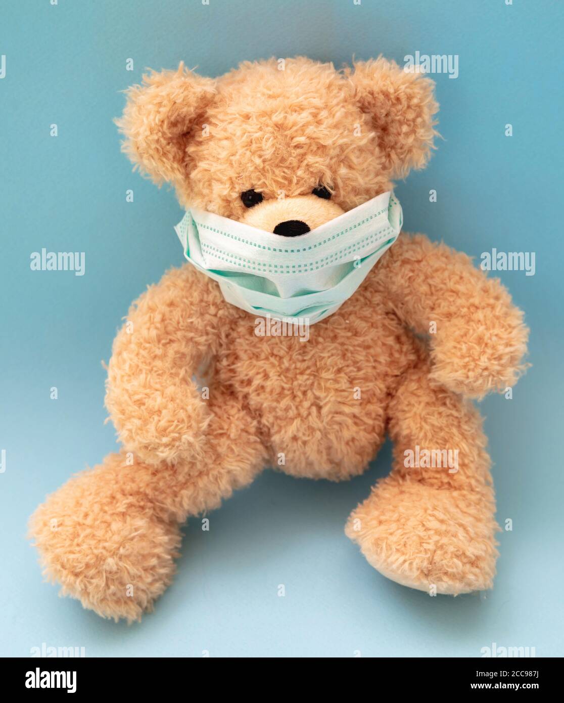 Children kids coronavirus and pollution protection concept. Τeddy bear ...