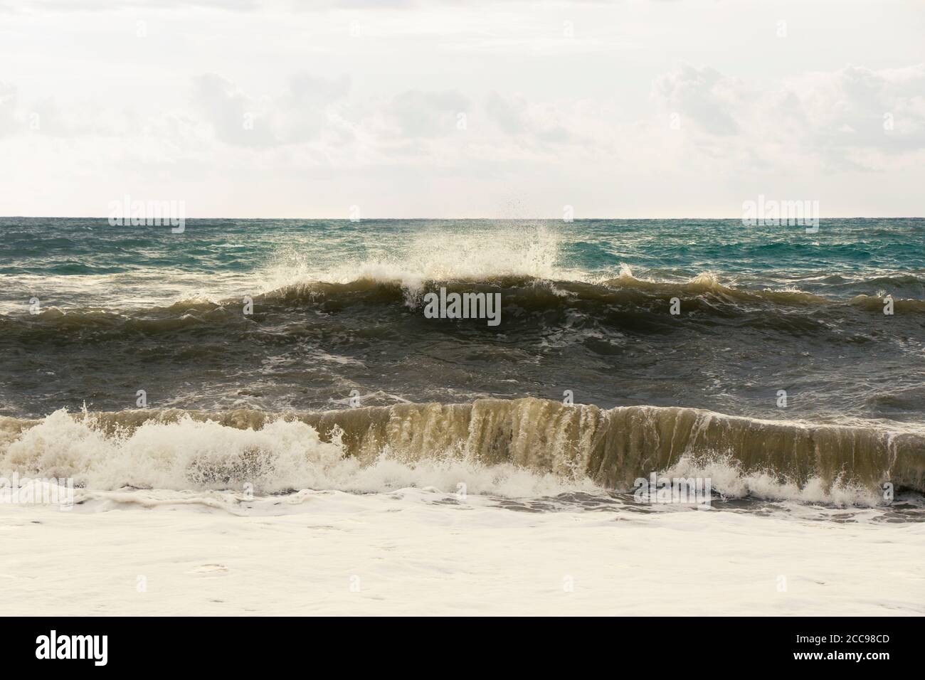 Stormy weather, waves and splashes in Batumi, Georgia. Stormy Black sea ...