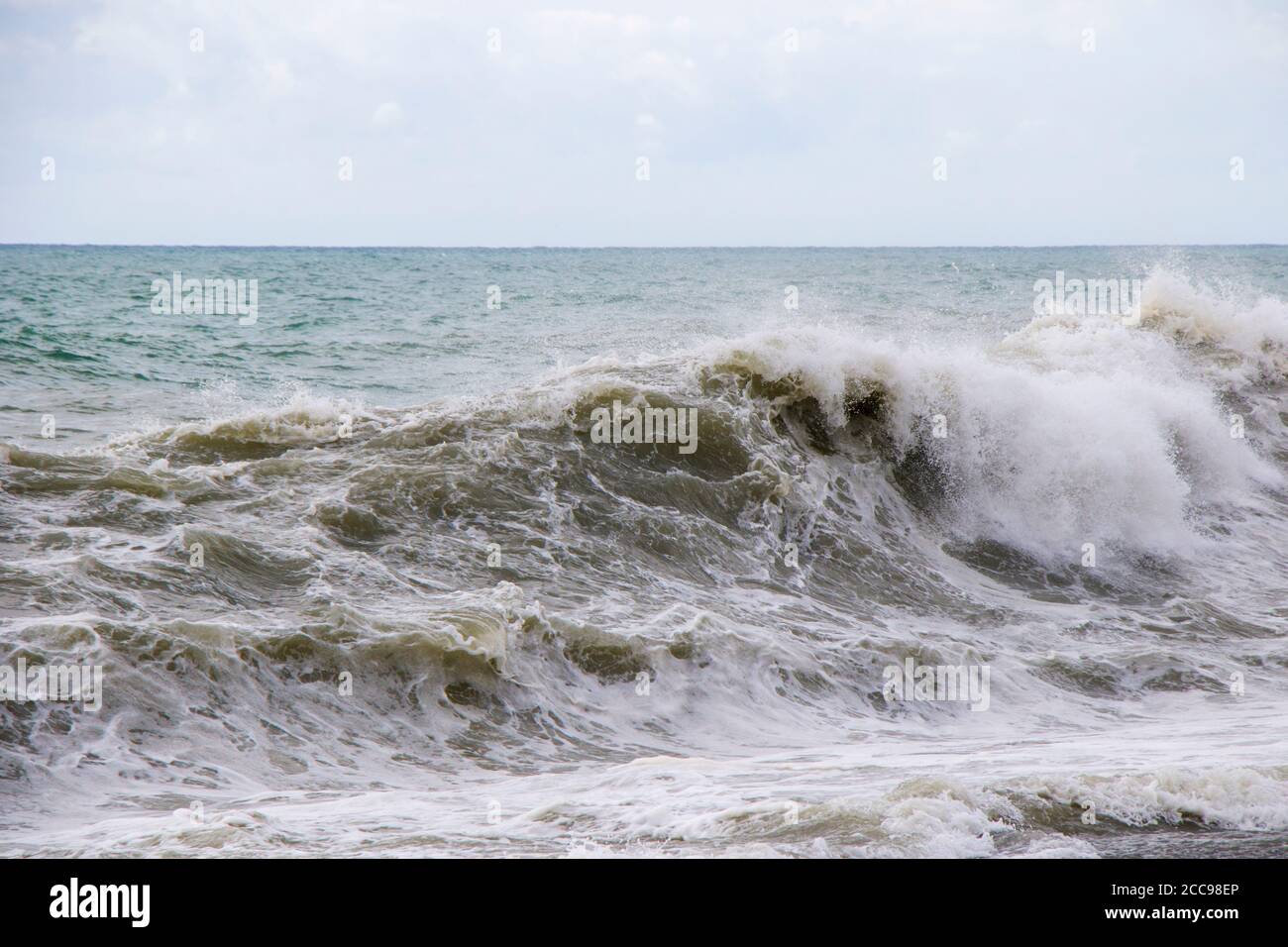 Stormy weather, waves and splashes in Batumi, Georgia. Stormy Black sea ...