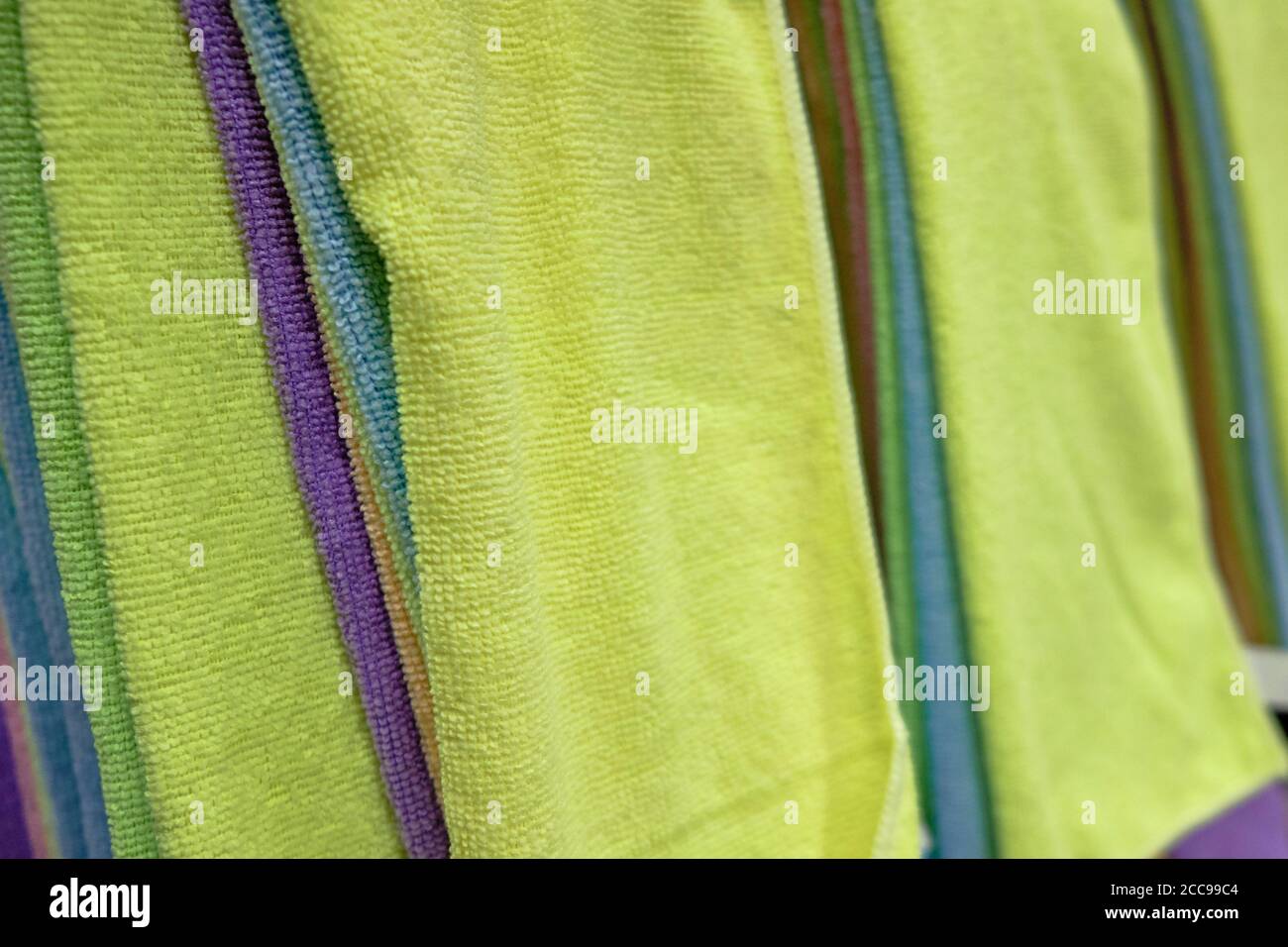 Lots of multi colored micro fiber clothes Stock Photo - Alamy