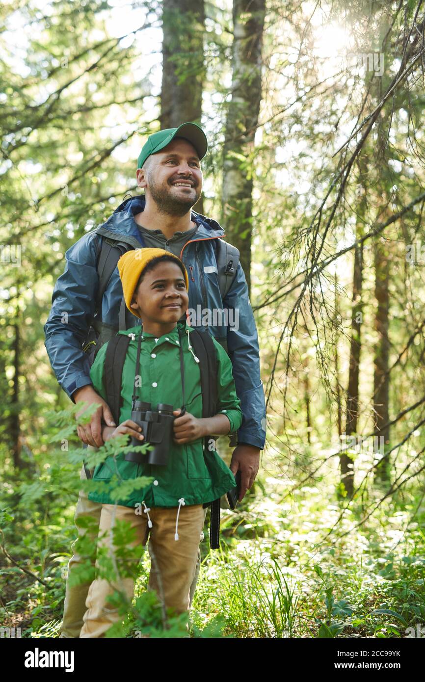 Father and his son go hiking together in the forest Stock Photo - Alamy