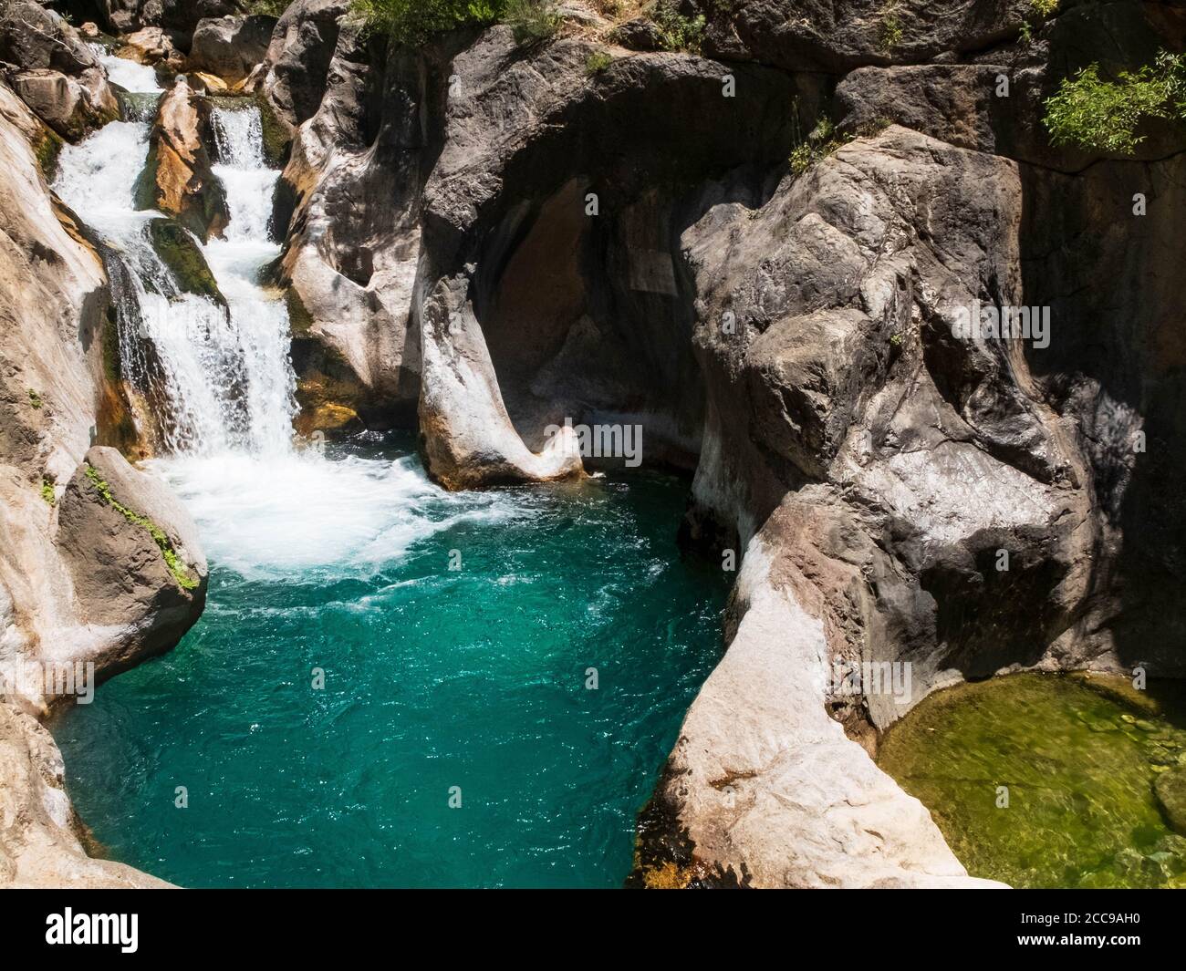 Cascade of waterfalls and natural pool at Sapadere Canyon, Alanya ...