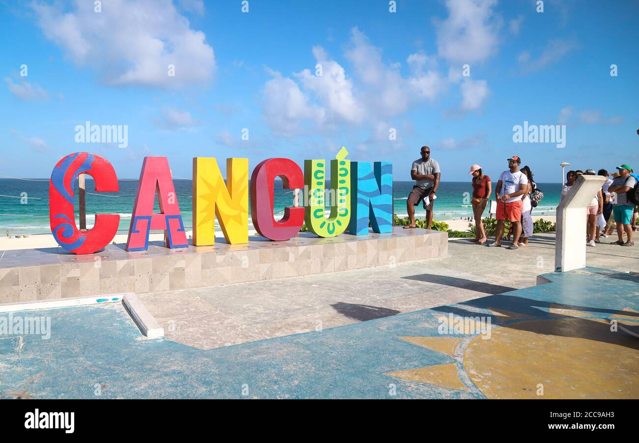CANCUN, YUCATAN, MEXICO - Jul 19, 2019: Tourists pose for photos next ...
