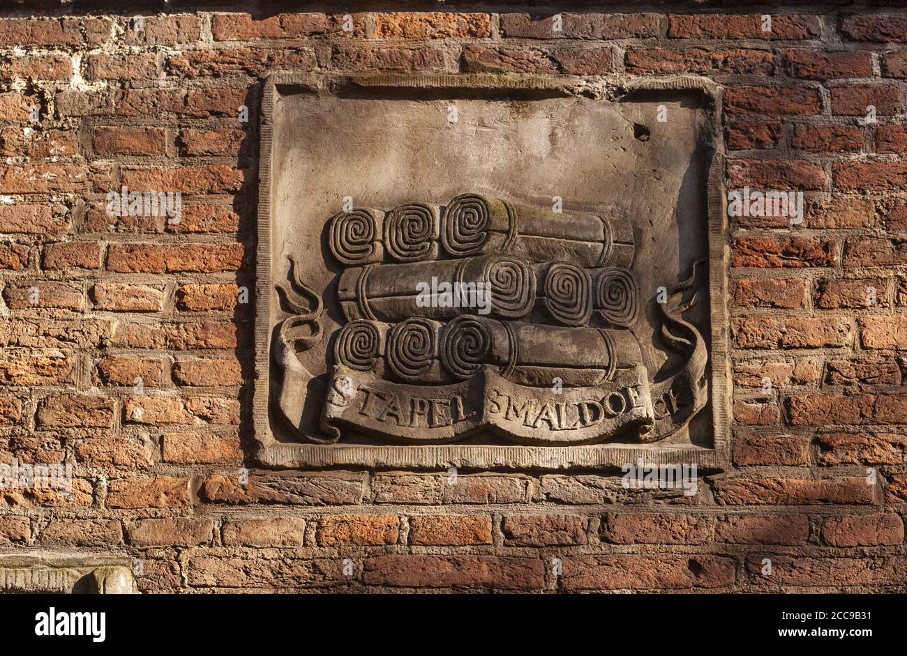 old guild sign on an brick facade in Amsterdam, Netherland Stock Photo ...