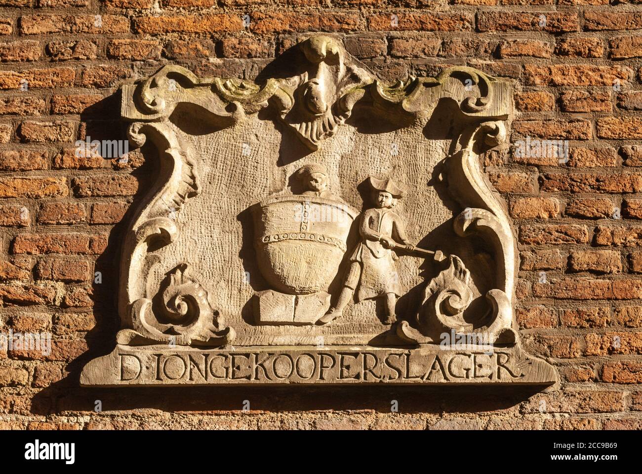 old guild sign on an brick facade in Amsterdam, Netherland Stock Photo ...