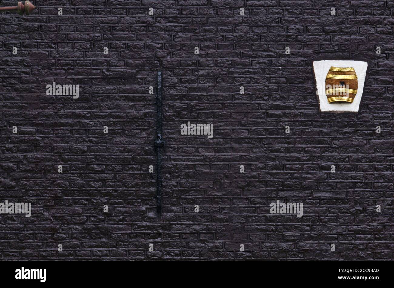 guild sign on an Amsterdam brick facade Stock Photo - Alamy