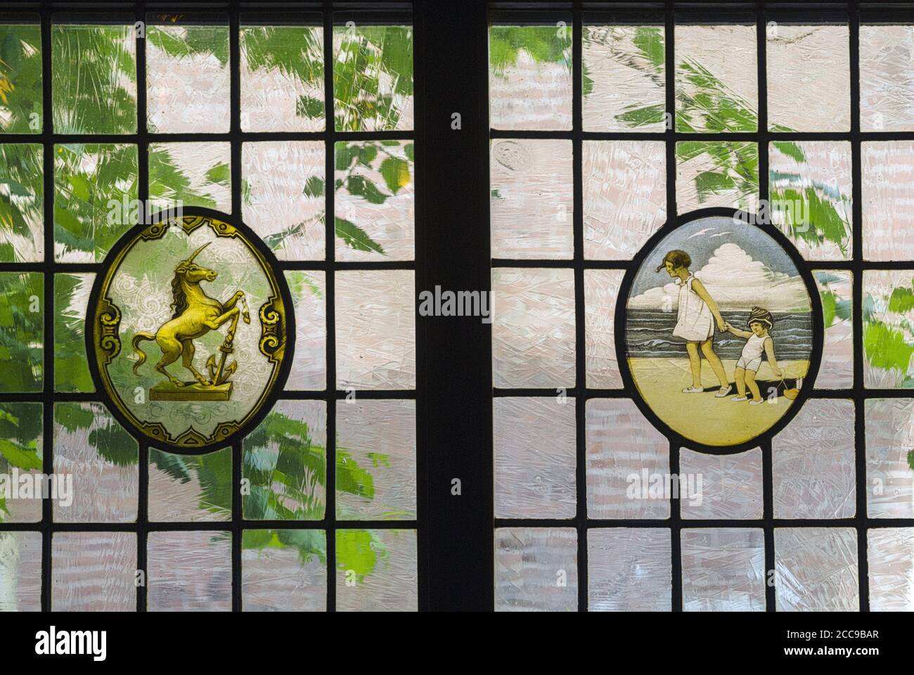 stained glass window on the facade of a beautiful house in Amsterdam ...