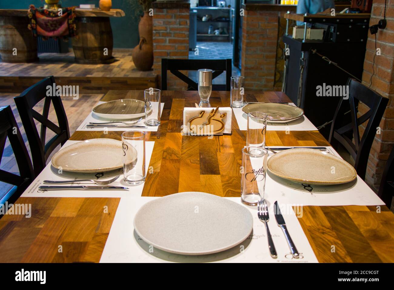 Restoration table service set plates, spoons and knifes, glasses and ...