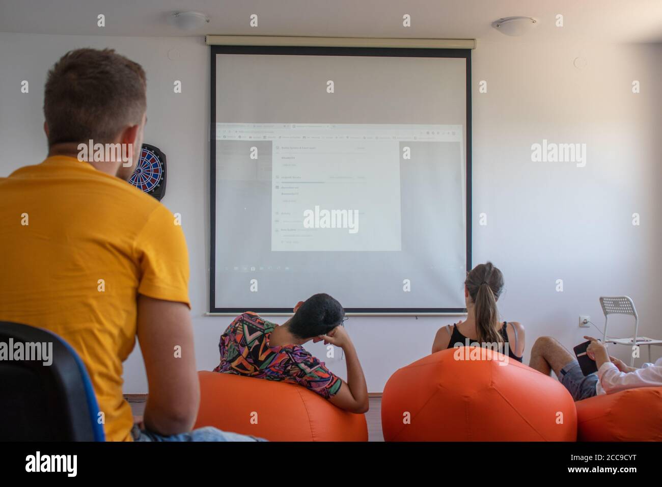 Sibenik Croatia August 2020 A group of students watching a powerpoint ...