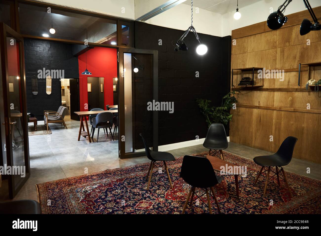 Lounge area of a modern office after working hours Stock Photo - Alamy
