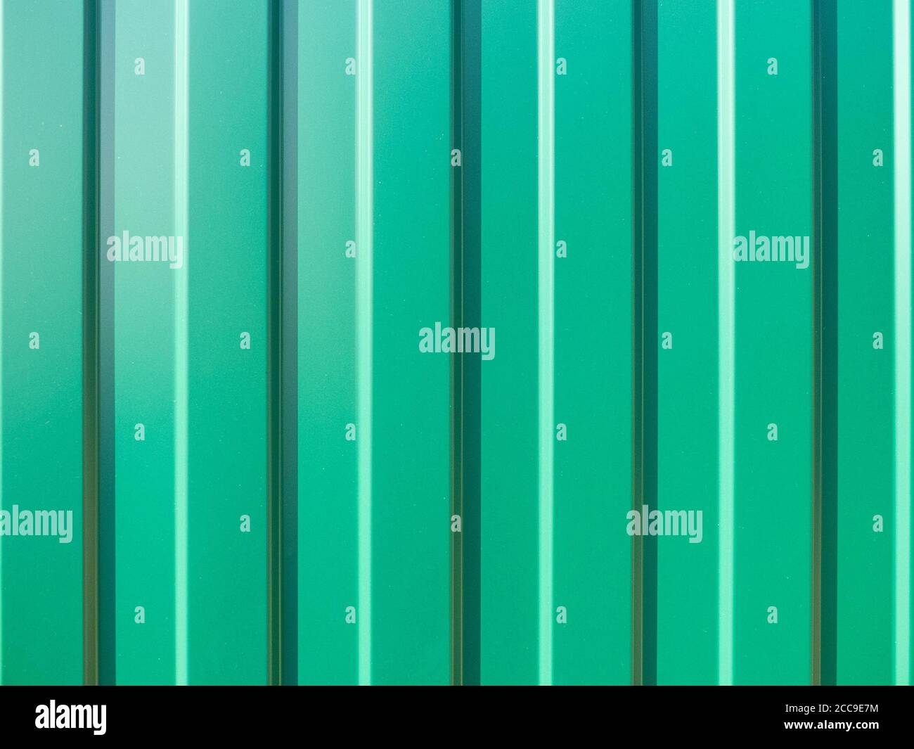 Stainless green colored galvanized profiled sheet. Background or ...
