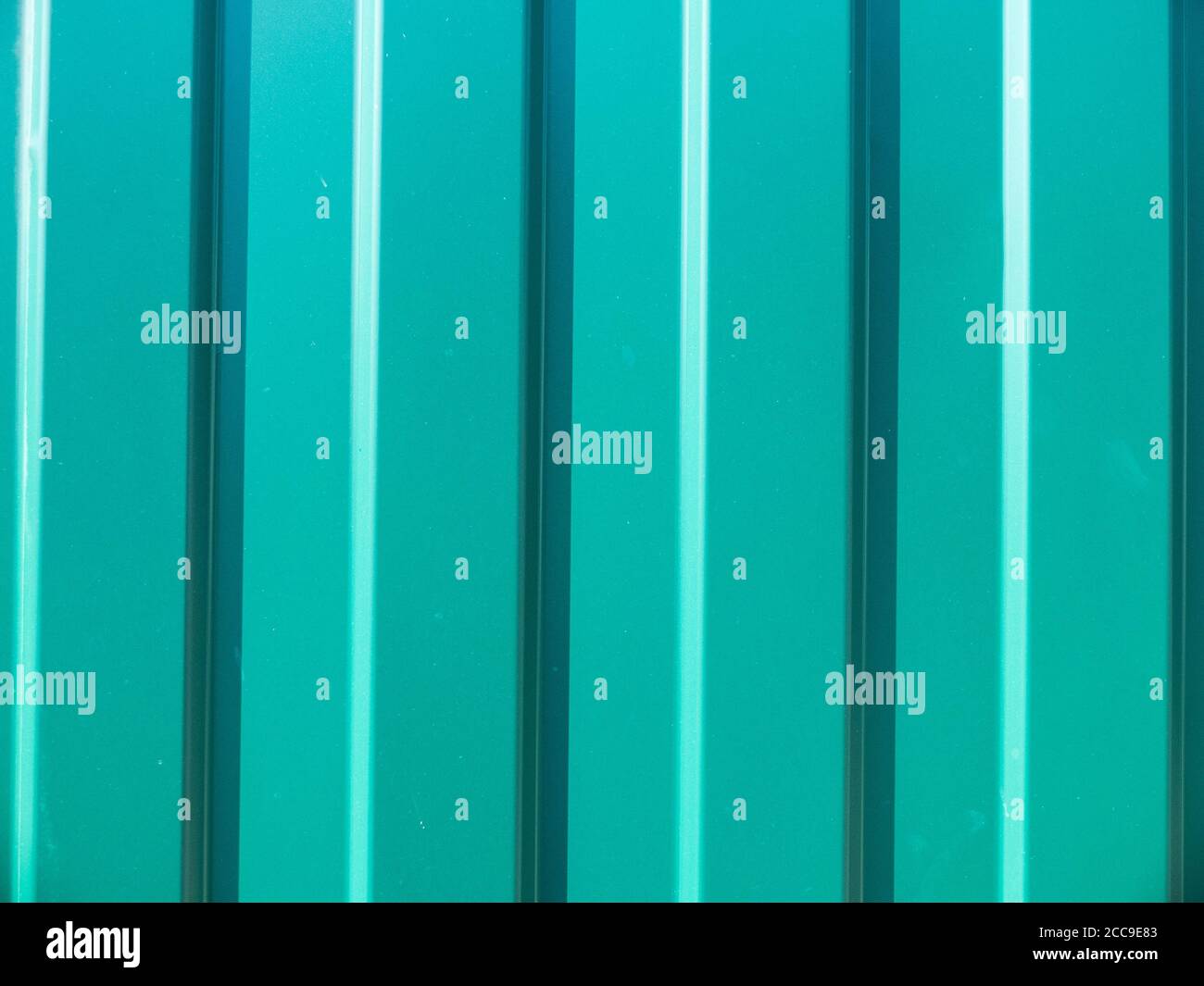 Stainless green colored galvanized profiled sheet. Background or ...