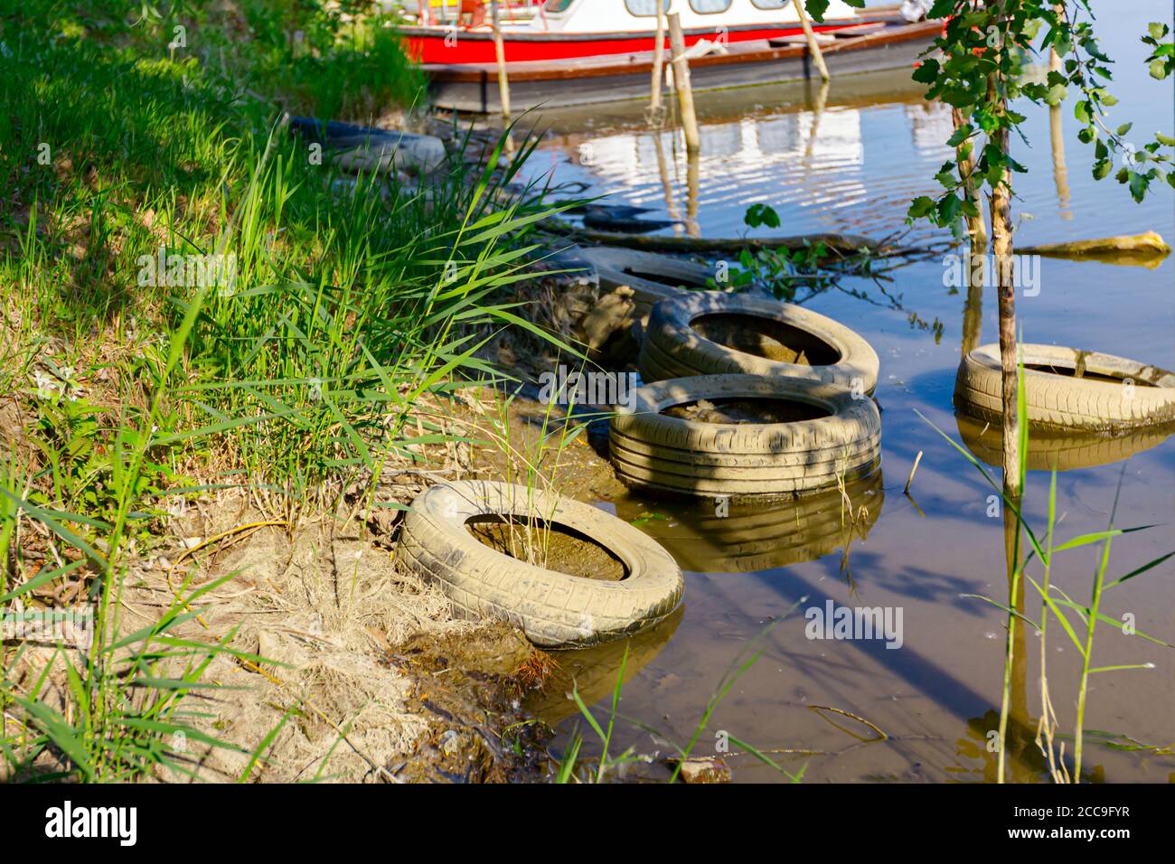 Improvised dock, place for docking fishing boats on shore Stock Photo ...