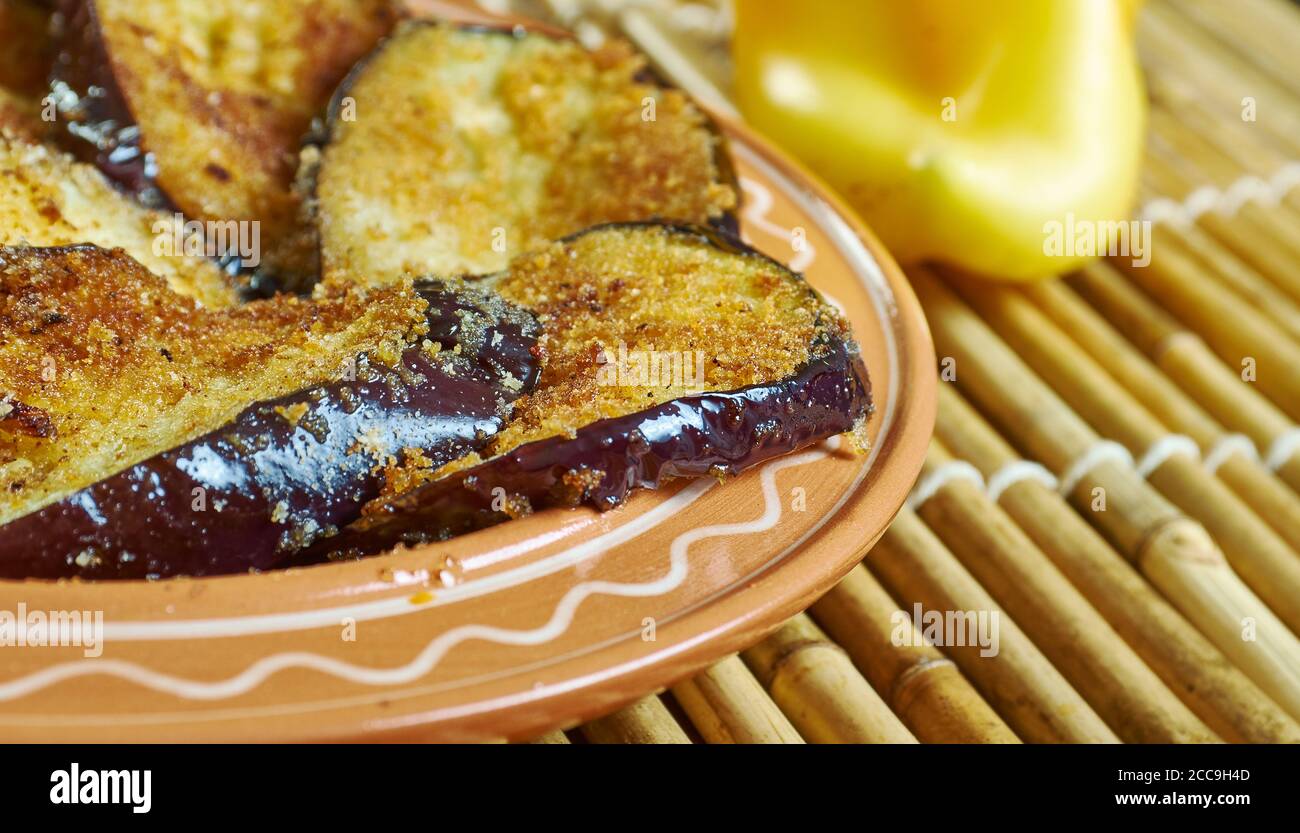 Bengali Begun Bhaja - vegetarian recipe of shallow-fried eggplant disks ...