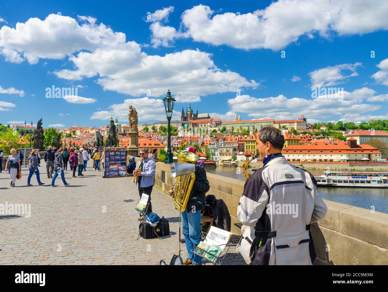 Street musicians play brass instruments hi-res stock photography and ...