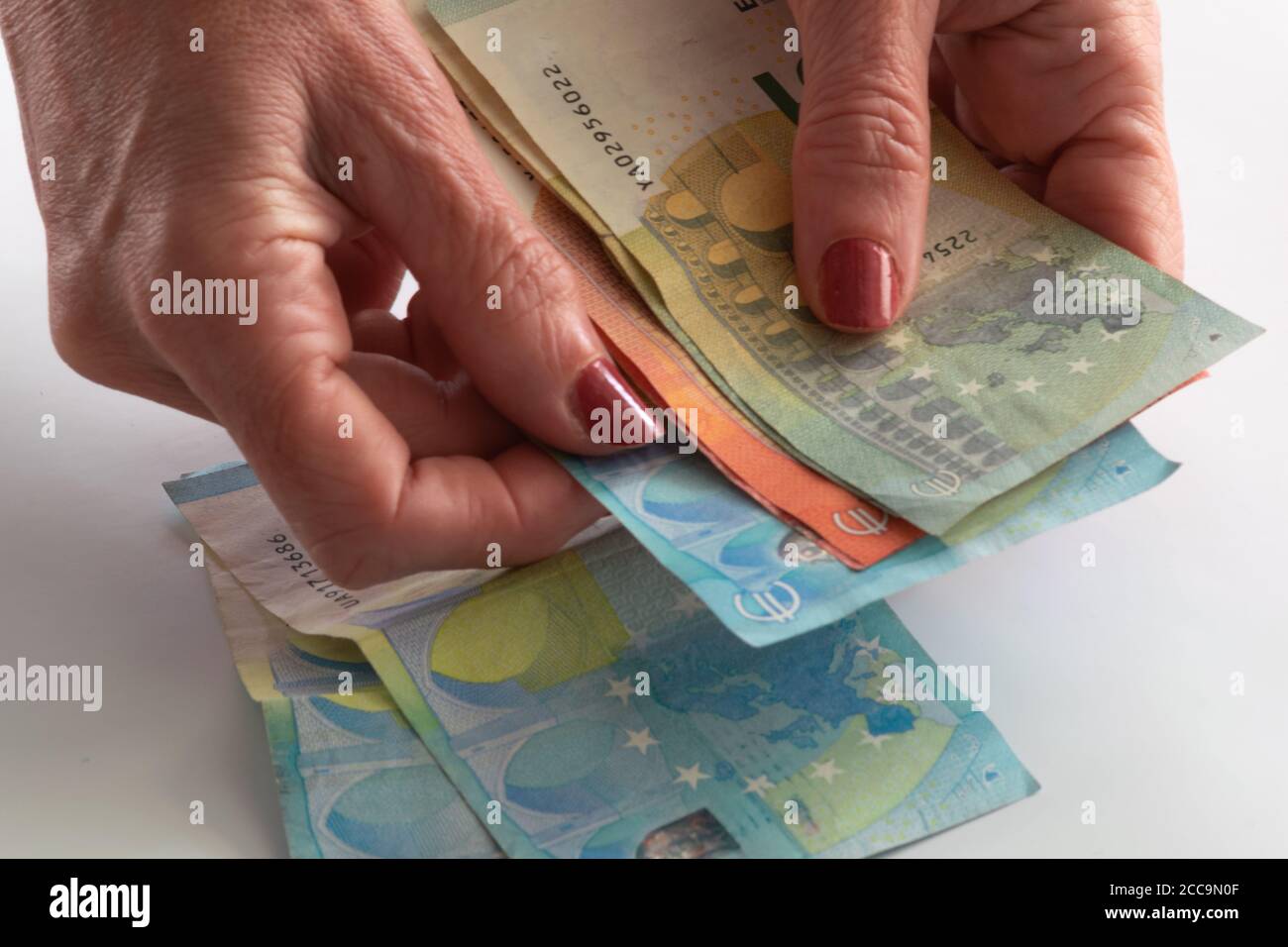 Counting euro hi-res stock photography and images - Alamy