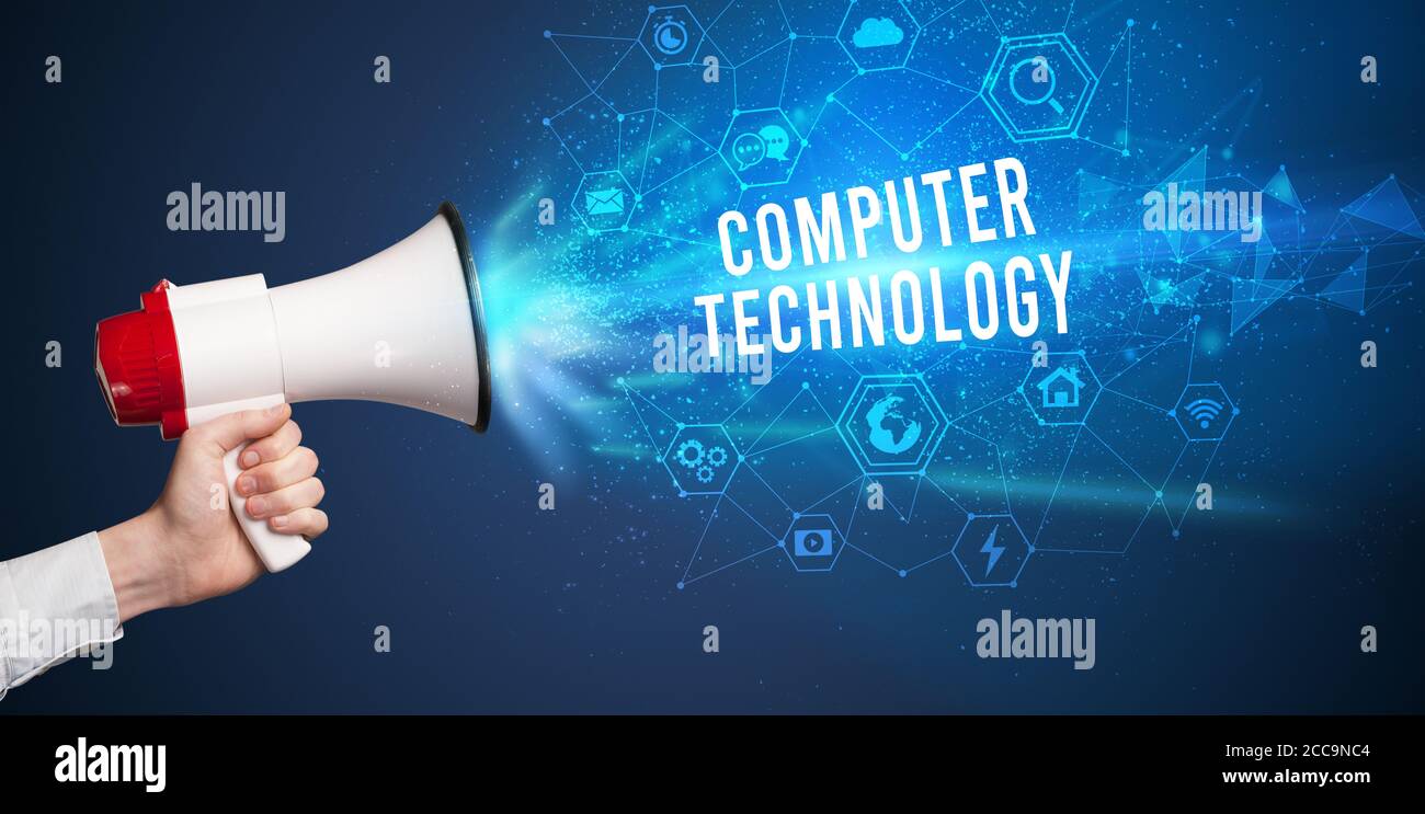Young woman shouting in megaphone with COMPUTER TECHNOLOGY inscription ...