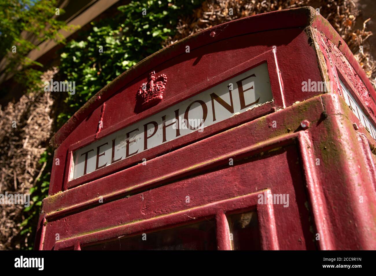 Old British Telephone Booth. A closeup of an old British telephone ...