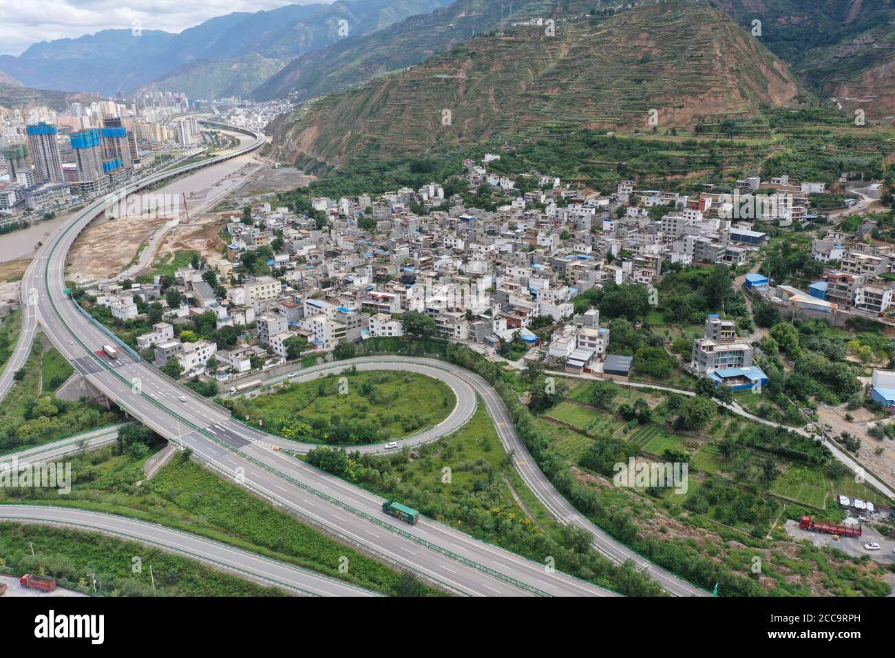 Longnan. 20th Aug, 2020. Aerial photo taken on Aug. 20, 2020 shows the ...