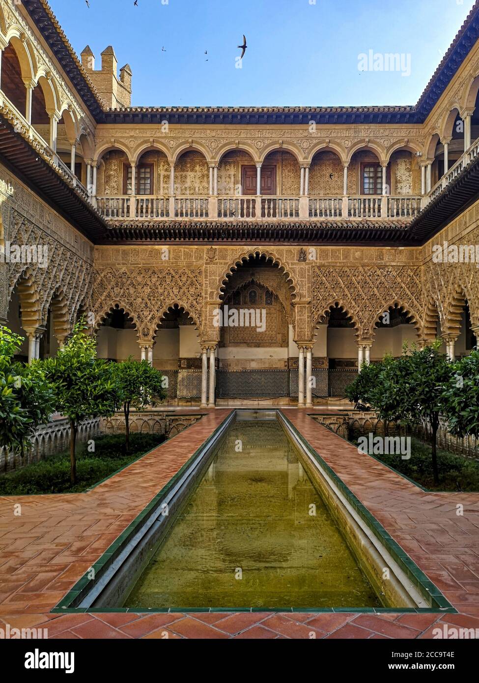 Breathtaking view of the iconic palace of Alcazar in Seville, Spain ...