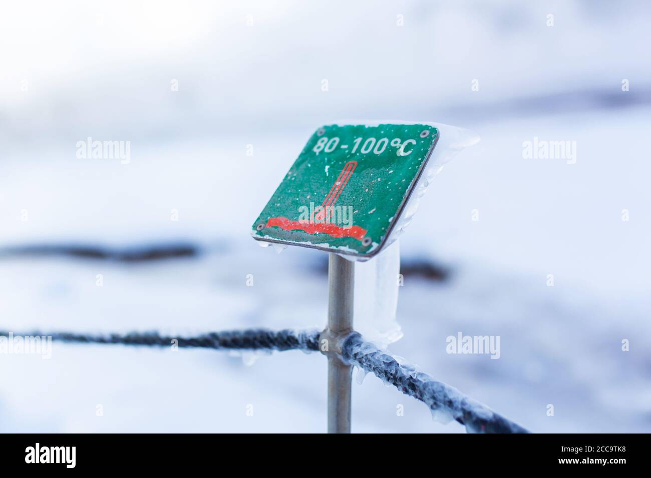 A sign warning about high water temperatures in a geyser. Popular ...