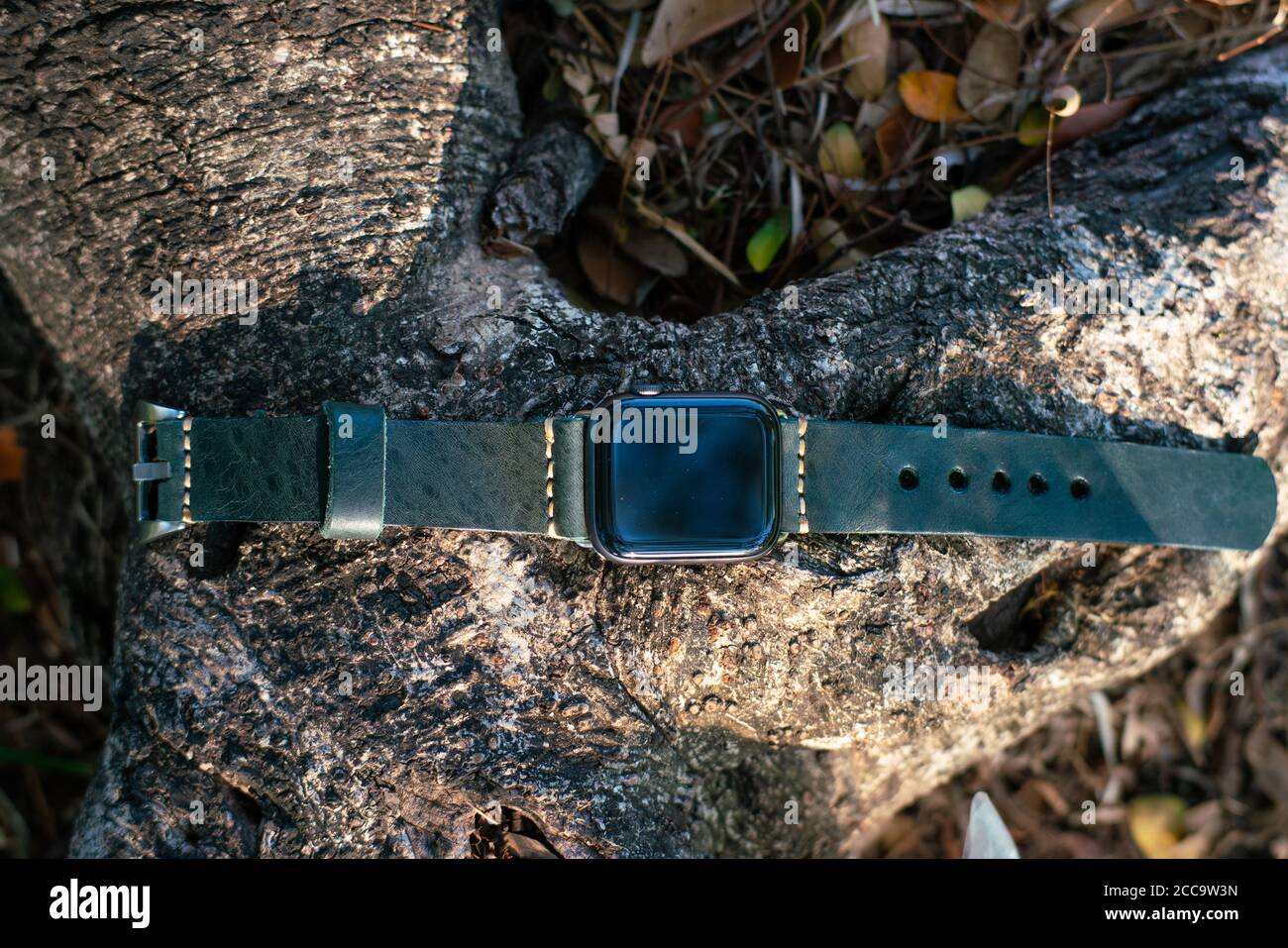 Olive green leather watch strap hand band object craftsmanship working ...