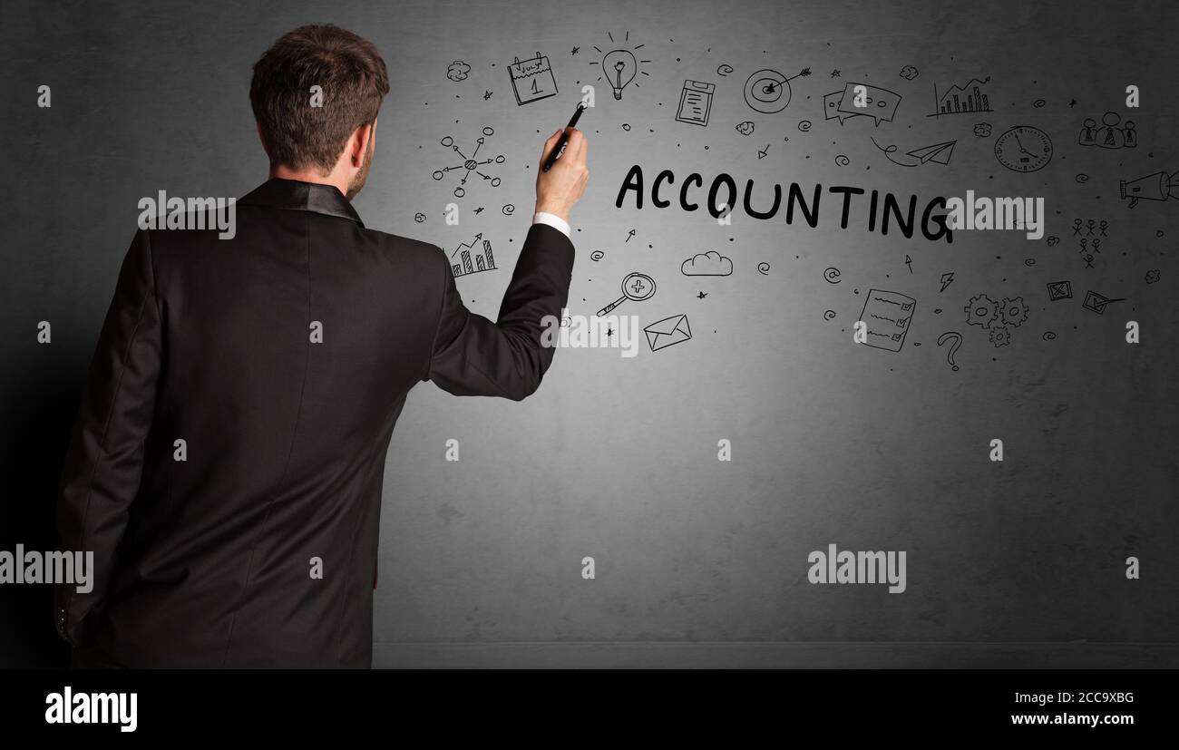 businessman drawing a creative idea sketch with ACCOUNTING inscription ...