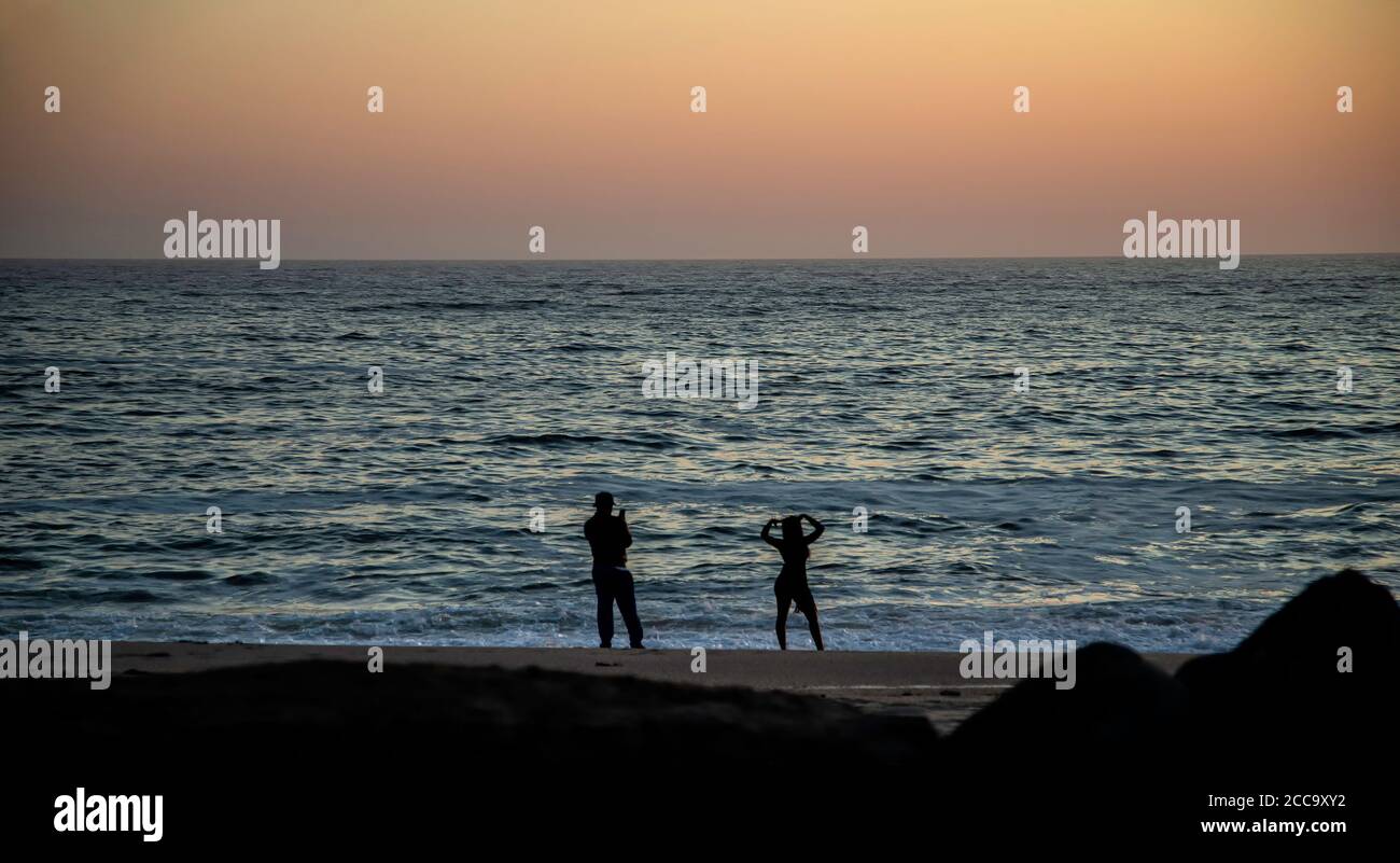 Posing at sunset hi-res stock photography and images - Alamy
