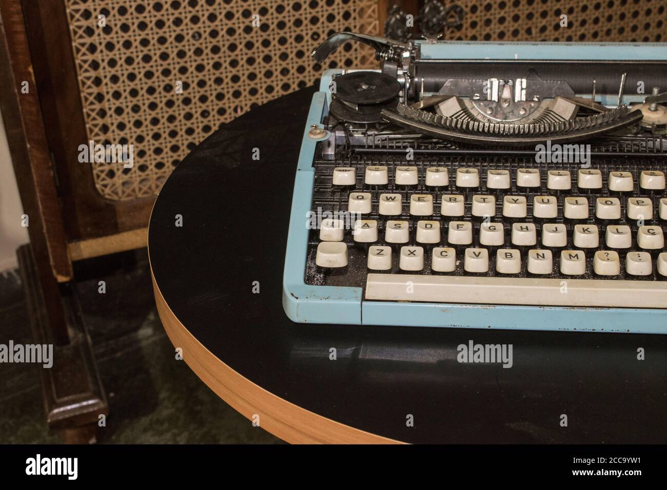 Old blue typewriter retro objects concept image Stock Photo - Alamy